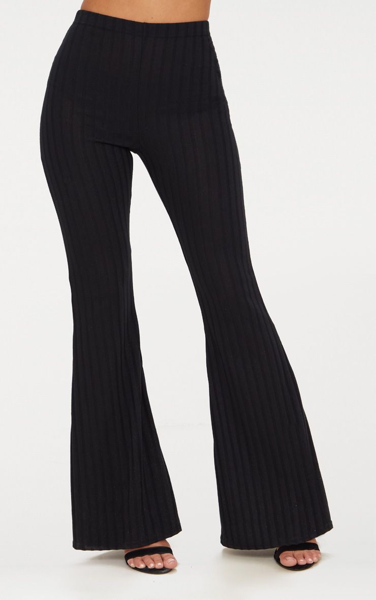 Petite Black Ribbed Flares | Petite | PrettyLittleThing
